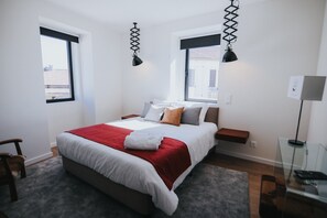 Quartos à prova de som, Wi-Fi de cortesia, roupa de cama