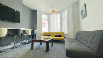 Apartamento, suíte | Lounge