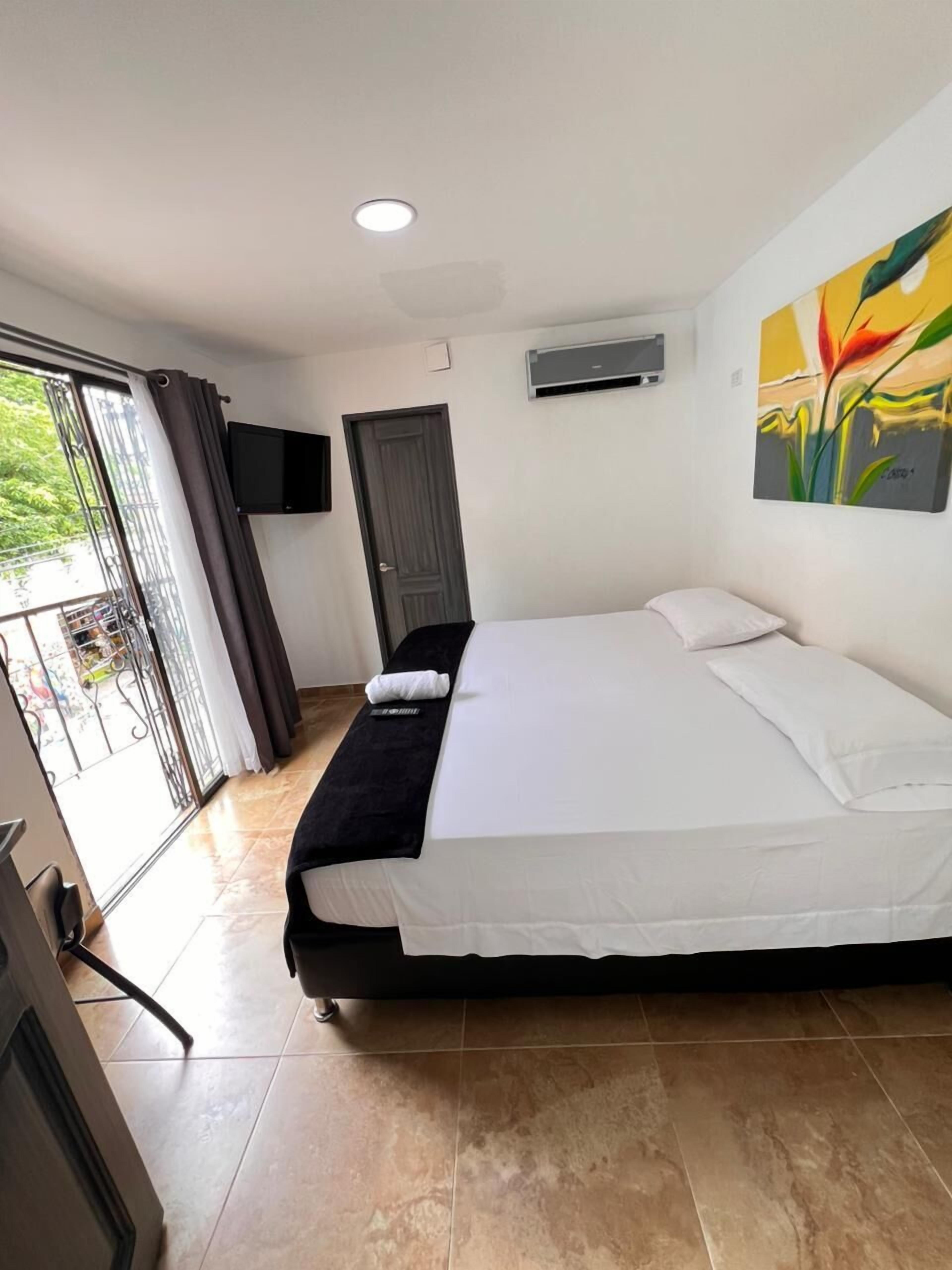 Quarto Duplo Superior | Minibar, cofre no quarto, ferro/tábua de engomar, Wi-fi grátis 