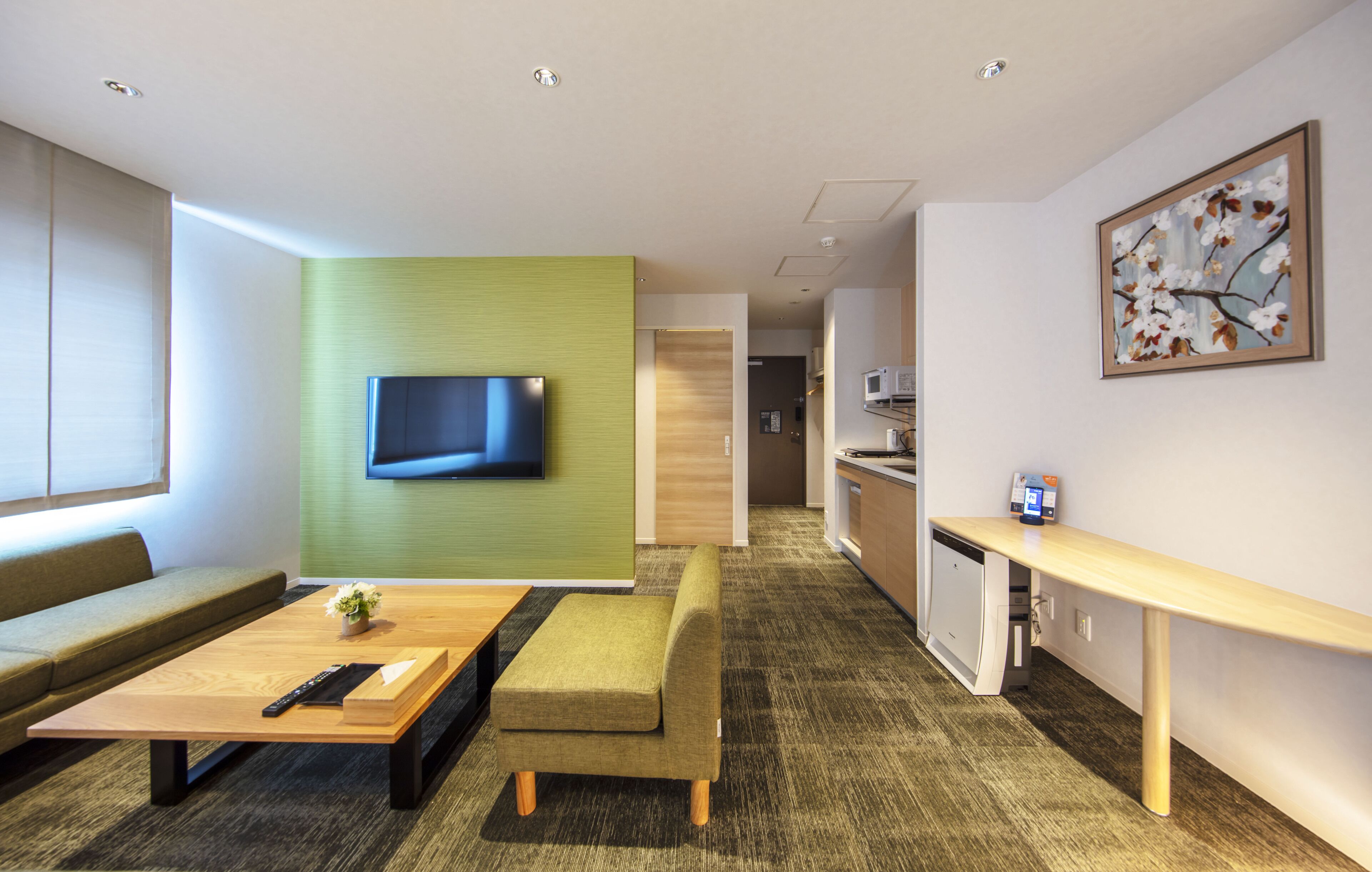 Quarto Deluxe, não fumadores (F) | Sala de estar | TV de ecrã plano 