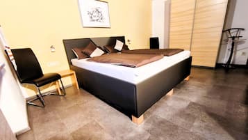 Apartamento | 2 quartos, Wi-Fi de cortesia, roupa de cama