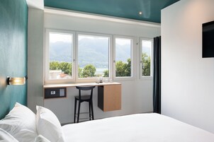 Edredões de penas, camas de colchão pillowtop, minibar grátis