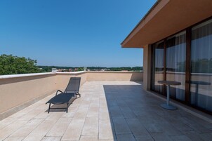 Suíte família, terraço | Terraço/pátio