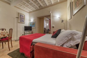 Apartamento, 1 quarto | Área de estar | TV de tela plana