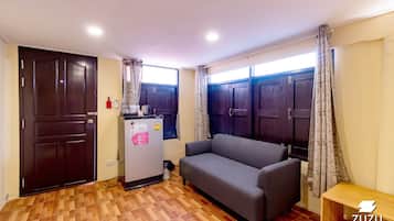 Quarto superior | Área de estar