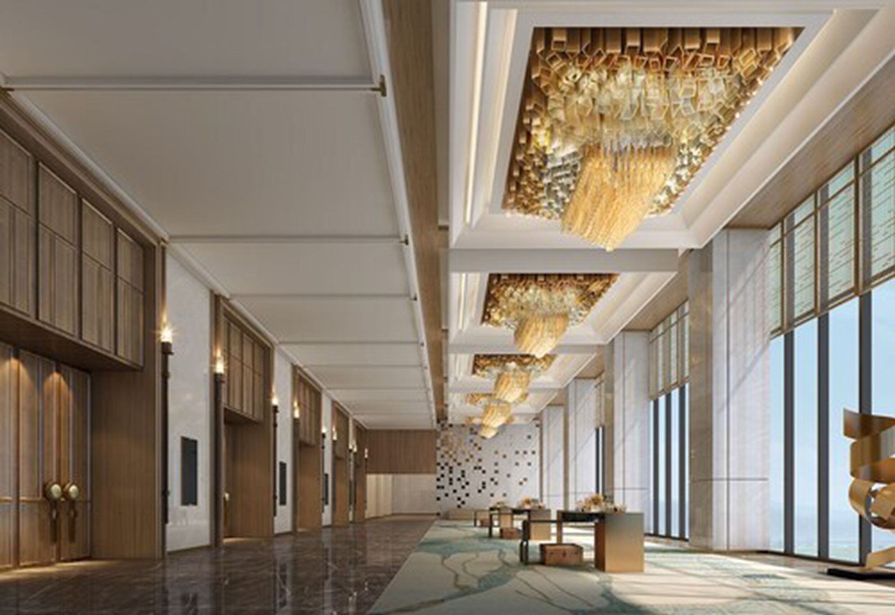 Um amplo hall de hotel com teto alto, janelas grandes e um lustre decorativo.