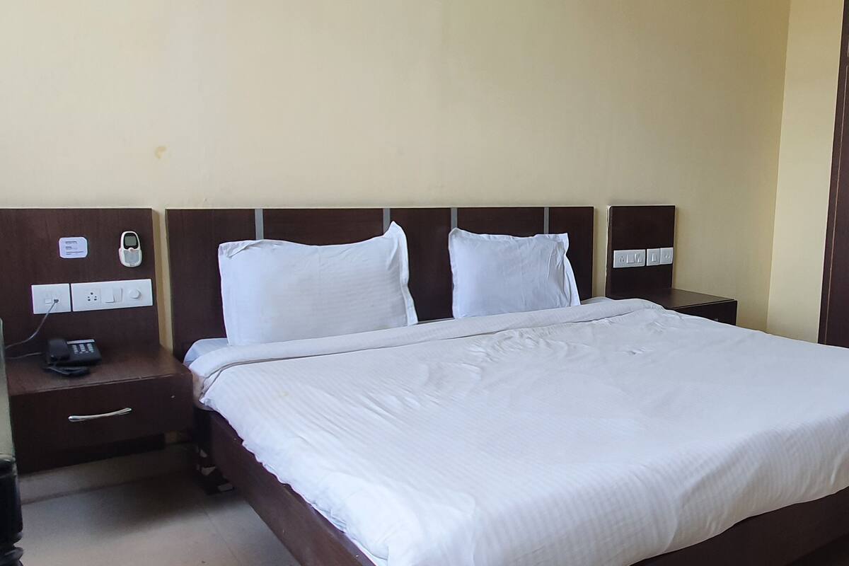 Quarto Básico | Camas de colchão Select Comfort, Wi-fi grátis, roupa de cama fornecida