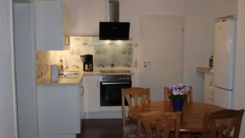 Apartamento | Cozinha privada | Cadeirão de bebê