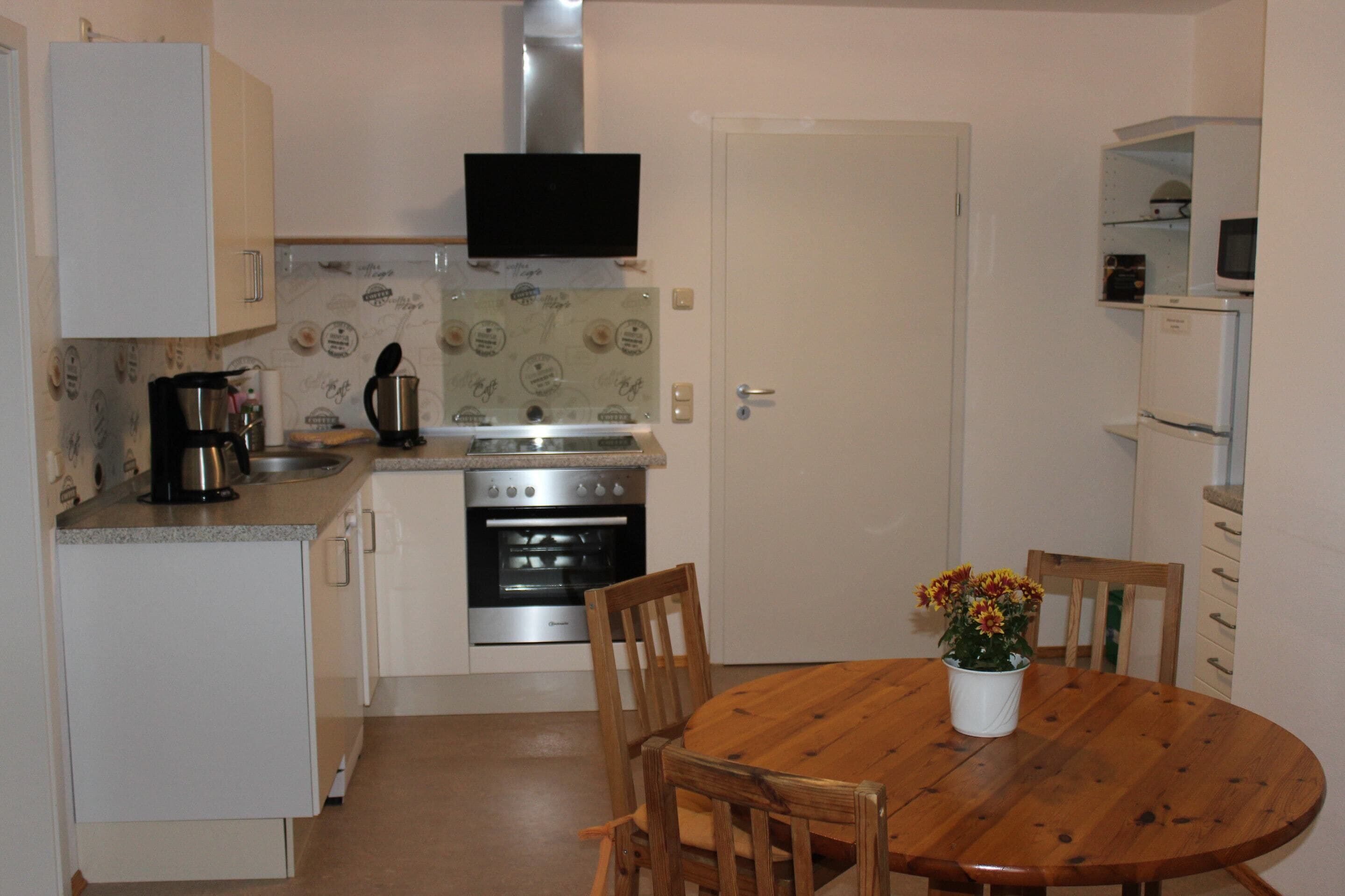 Apartamento | Cozinha privada | Cadeirão de bebê