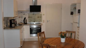 Apartamento | Cozinha privada | Cadeirão de bebê