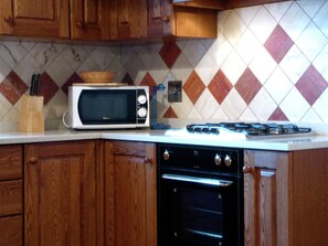 Casa | Cozinha privada | Cadeirão de bebê