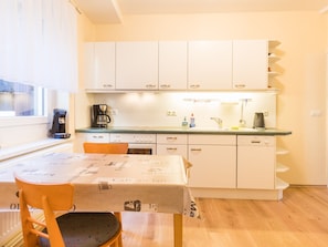 Casa | Cozinha privada | Cadeirão de bebê