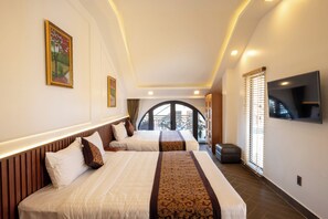 Apartamento superior | Roupas de cama premium, edredons de pluma