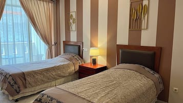 Quarto duplo luxo | Escrivaninha, Wi-Fi de cortesia, roupa de cama