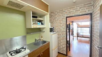 Apartamento (Win Bell nago 404) | 1 quarto, Wi-Fi de cortesia, roupa de cama