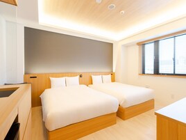 Quarto Twin Executivo, não fumadores (29sqm, for 4 Guests) | Cofre no quarto, secretária, Wi-fi grátis, roupa de cama fornecida 