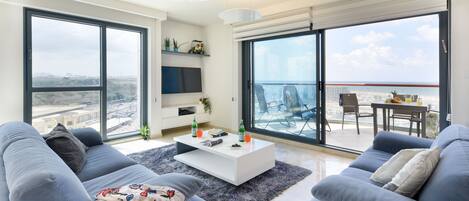 Apartamento, 2 quartos, varanda | Sala | Televisor de ecrã plano de 40 polegadas com canais por cabo