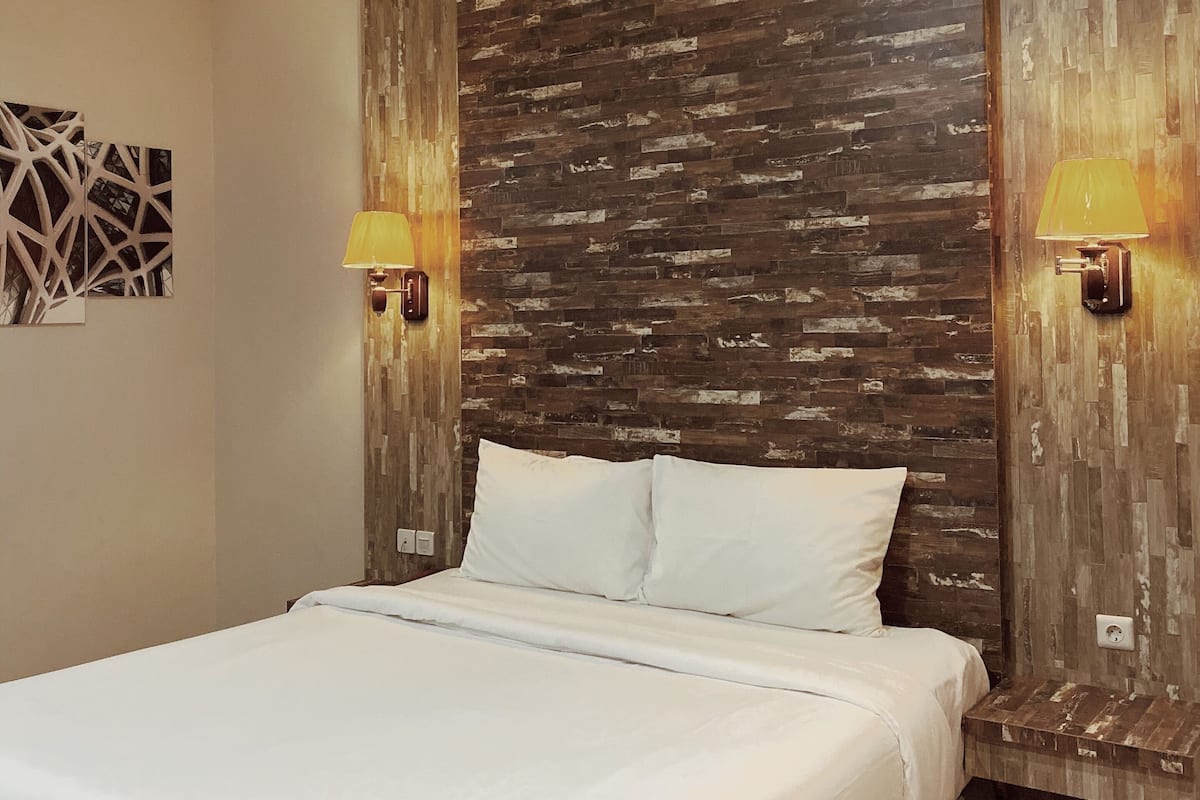 Quarto Duplo Superior | Minibar, cofre no quarto, ferro/tábua de engomar, Wi-fi grátis