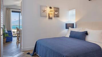 Suíte luxo, 1 quarto, vista para o porto, de frente para o mar | Roupas de cama premium, cofres nos quartos, escrivaninha