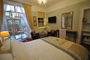 Quarto Duplo Tradicional, 1 cama queen-size, casa de banho anexa, vista para o jardim | Roupa hipoalergénica, com decoração personalizada 