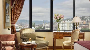 Suite Presidencial | Sala de estar | Televisor LCD de 42 polegadas com canais via satélite, televisor