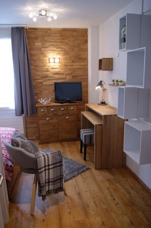 Quarto solteiro, 1 cama de solteiro grande | Edredons de pluma, frigobar, cofres nos quartos