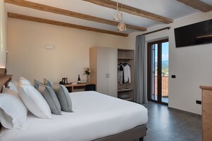 Suíte júnior | Cofres nos quartos, cortinas blackout, ferros/tábuas de passar roupa