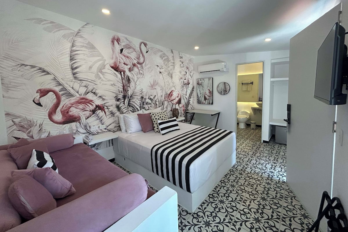 Suíte júnior | Cofres nos quartos, Wi-Fi de cortesia, roupa de cama