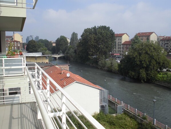 Apartamento Comfort, vista para o rio | Varanda