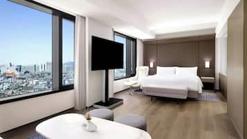 Suíte estúdio club, 1 quarto | Roupas de cama premium, edredons de pluma, cofres nos quartos