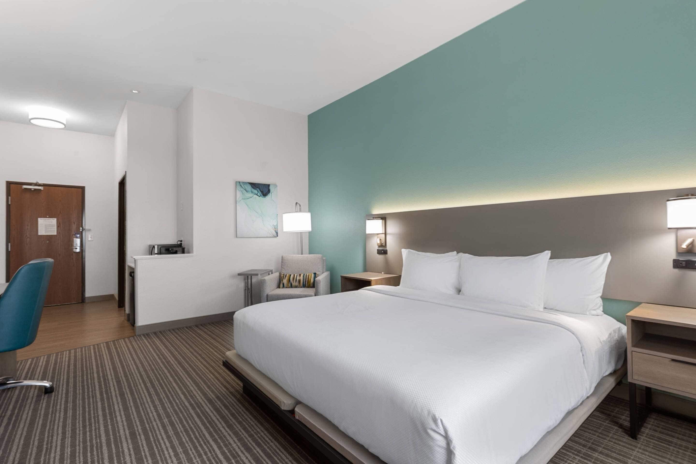 Quarto, 1 cama King, acessível, para não fumantes | Roupas de cama premium, cofres nos quartos, escrivaninha