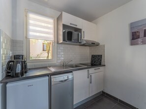 Appartement 2 pièces 4 personnes | Cozinha privada | Geladeira, micro-ondas, cooktop, lava-louças