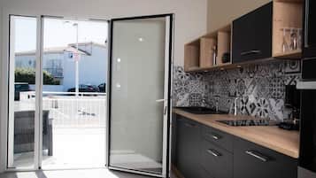 Duplex conforto | Área de estar | TV de tela plana