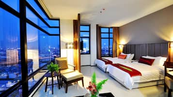 Express Suite, City View | Sala de estar | Televisor LCD de 42 polegadas com canais via satélite, televisor