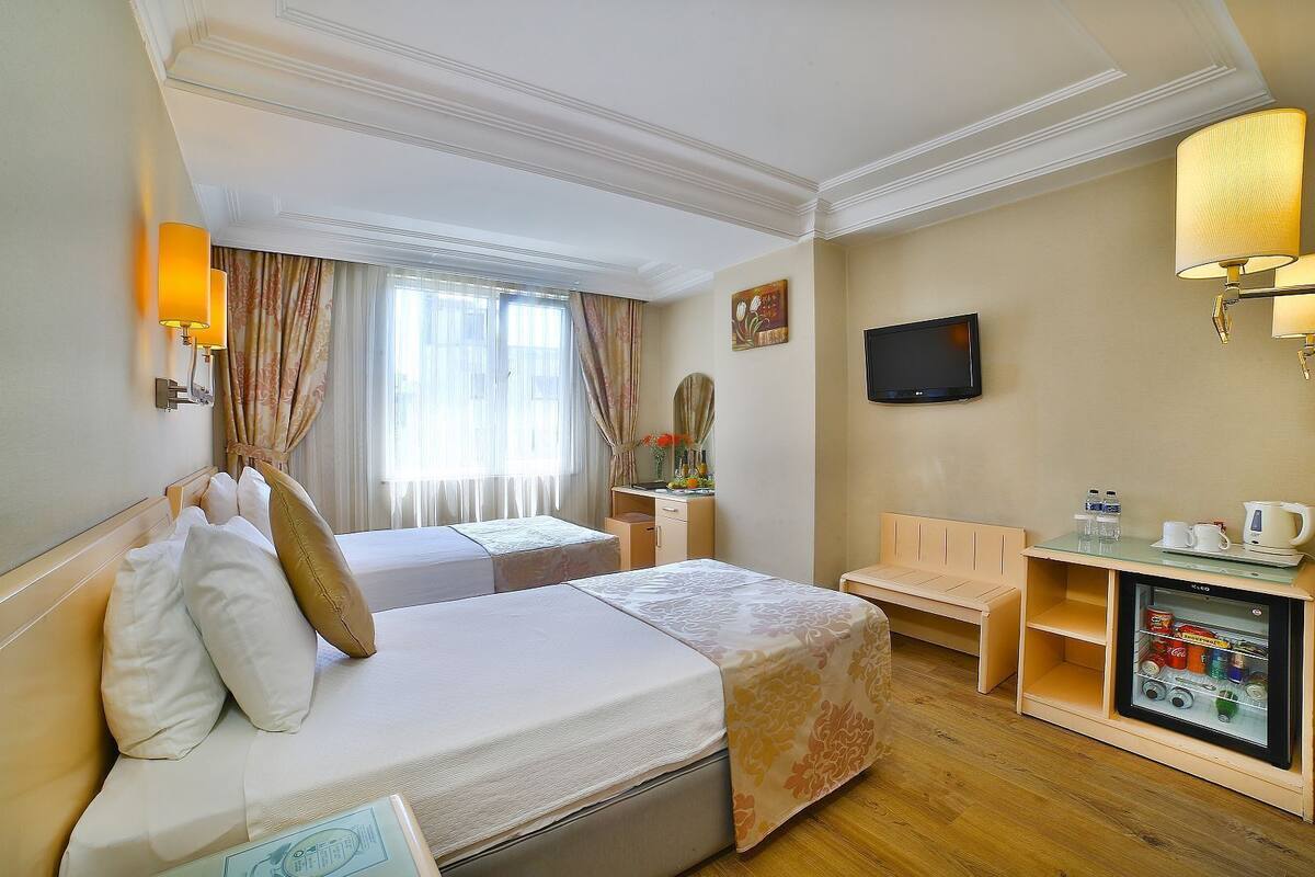 Camas de colchão viscoelástico, minibar 