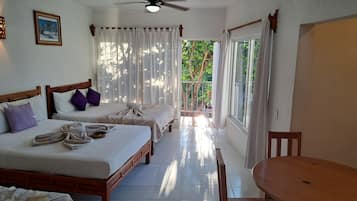 Quarto família, cozinha americana | Wi-Fi de cortesia, roupa de cama