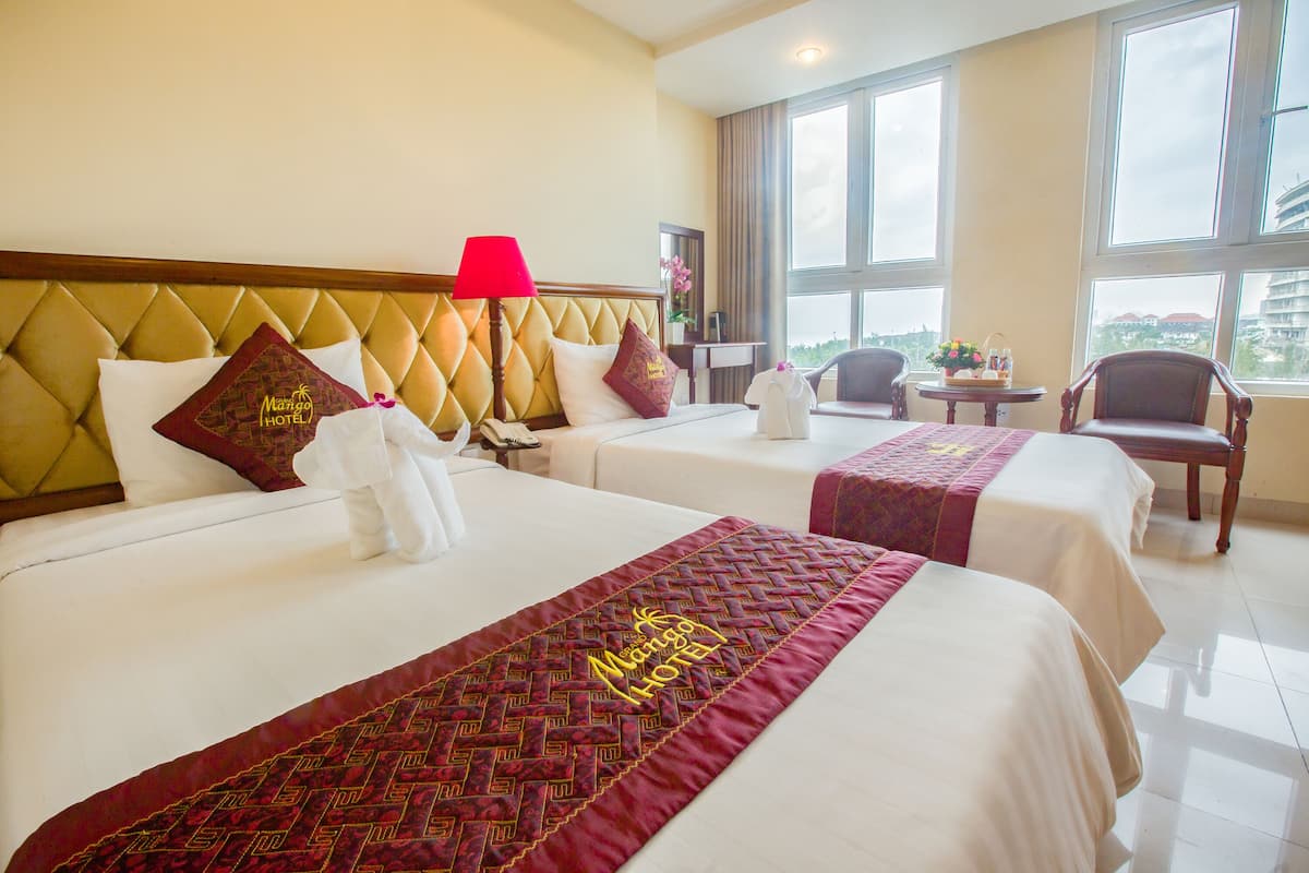 Quarto duplo superior | Frigobar, cofres nos quartos, escrivaninha, Wi-Fi de cortesia