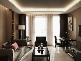 Suite Superior, 1 cama king-size | Sala de estar | Televisor, filmes pagos 