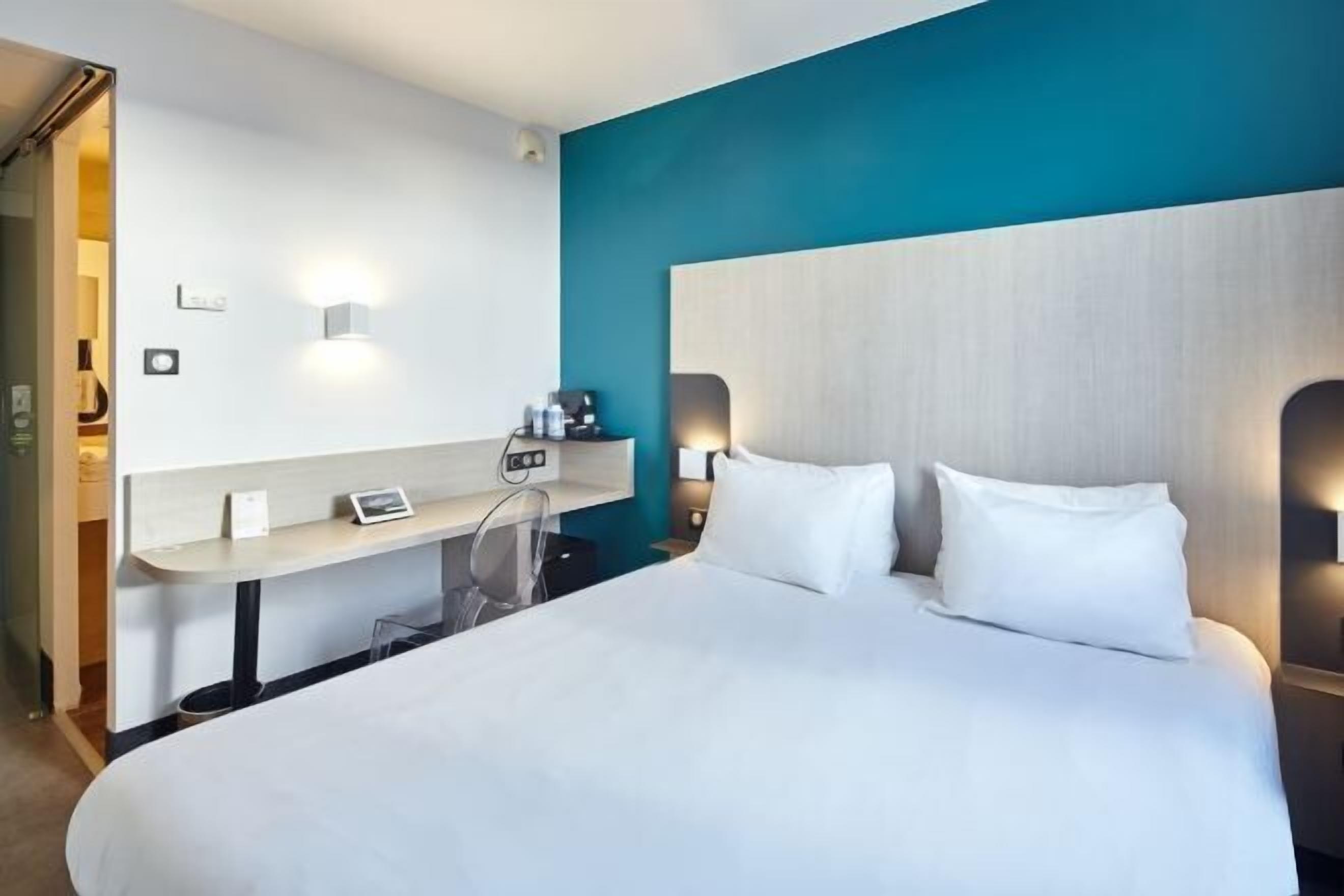 Minibar, secretária, cortinas/cortinados opacos, quartos insonorizados 