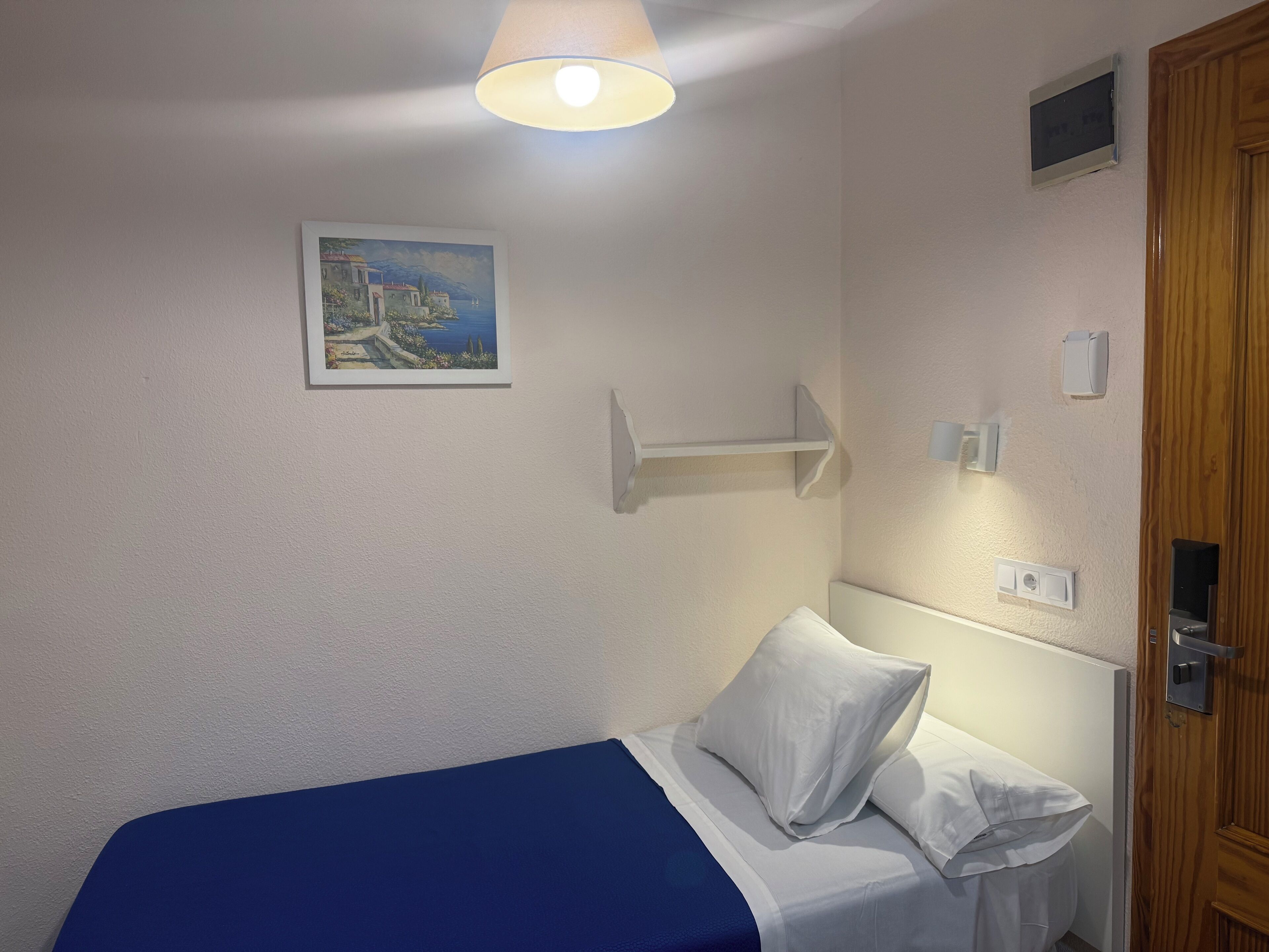 Quarto Individual | 1 quarto, cortinas/cortinados opacos, Wi-fi grátis 