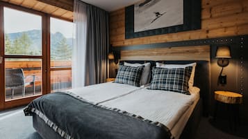 Apartamento Deluxe, 2 quartos, kitchenette, vista para a montanha | 2 quartos, ferro/tábua de engomar, berços/camas para crianças