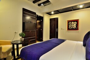 Suite Deluxe | Minibar, cofre no quarto, secretária, ferro/tábua de engomar