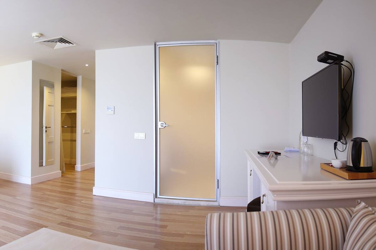 Quarto família | Frigobar, cofres nos quartos, quartos à prova de som, Wi-Fi de cortesia