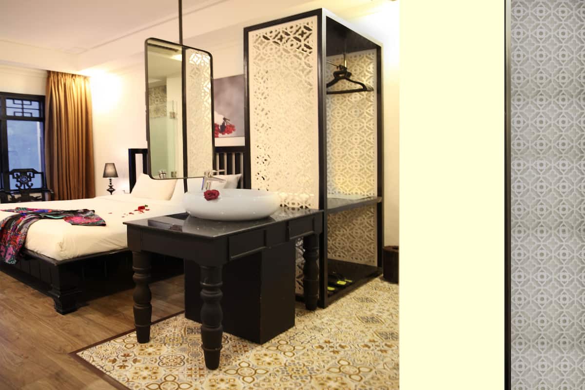 Quarto Deluxe, varanda | Comodidade do quarto