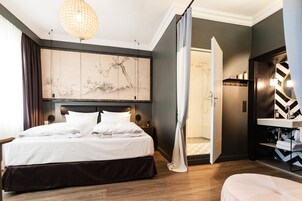 Suíte júnior | Roupas de cama antialérgicas, frigobar, cofres nos quartos