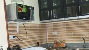 Apartamento em Condomínio Fechado, 2 quartos | Cozinha privada