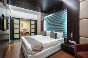 Suite, 1 cama de casal | Minibar, cofre no quarto, camas desdobráveis, Wi-fi grátis 
