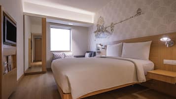 Roupas de cama premium, cofres nos quartos, escrivaninha