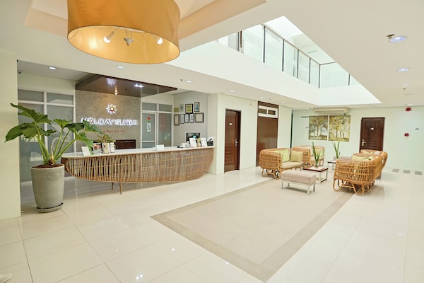 Holiday Suites Business District (Empire Suites Hotel) - Puerto Princesa