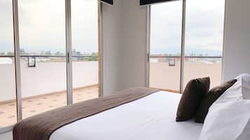 Apartamento família | Cofres nos quartos, cortinas blackout, Wi-Fi de cortesia, roupa de cama